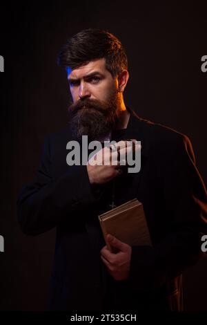 Pastor with a Bible in his hand during a sermon The preacher delivers a ...