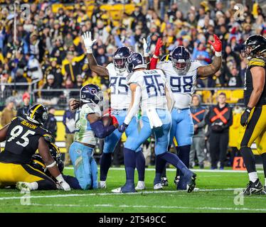 Tennessee Titans' Derrick Henry (22) is tackled by Indianapolis Colts ...