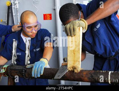 DC Olympics, pipe patching, USS Peleliu Stock Photo - Alamy