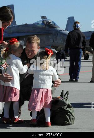 family, Homecoming, hugs, kids, Pilot Stock Photo - Alamy