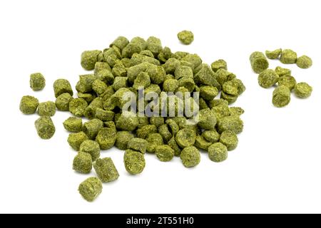 Pile of hop pellets on white background Stock Photo - Alamy