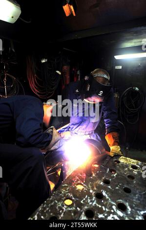 USS Carl Vinson machine shop activity 141025 Stock Photo - Alamy