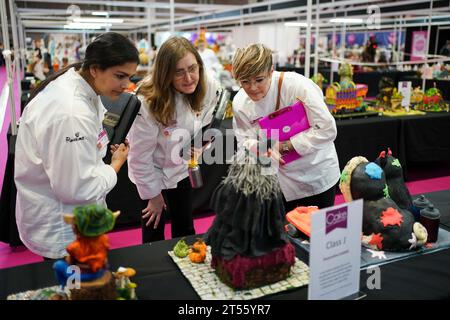 Judging takes place of the competition cakes during Cake International ...