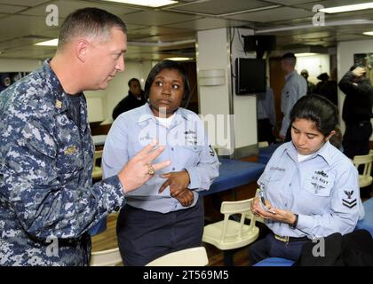 U.S. Pacific Fleet Master Chief Smitty Tocorzic congratulates recruits ...