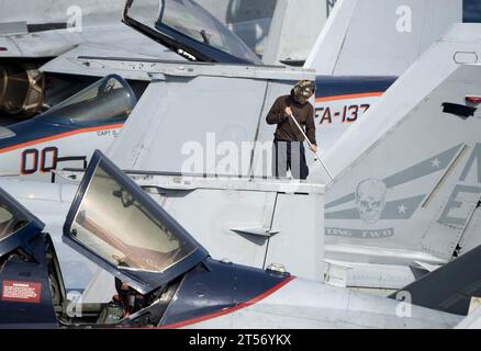 US Navy A Sailor assigned to the Bounty Hunters of Strike Fighter ...