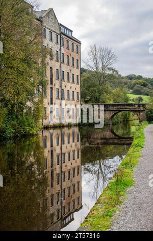 A disused mill has been converted to flats on the banks of the Rochdale ...