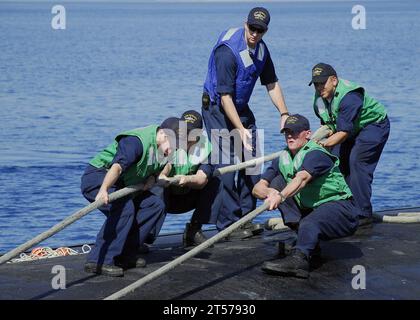 US Navy Sailors conduct mooring operations as the Los Angeles-class ...