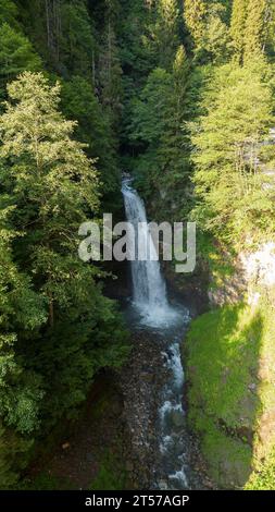 Palovit waterfall. Aerial view of waterfall flowing over mountain ...
