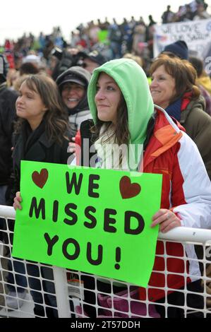 US Navy Family members wait anxiously for their loved ones to return ...
