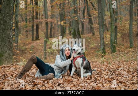 Unconditional love. Siberian husky favorite pet. Animal husbandry. Girl ...