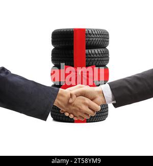 Young tyre repairman in red coveralls isolated on white background ...