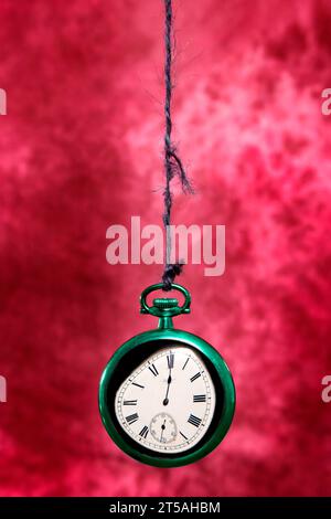 Deformed clock with Roman numerals Stock Photo - Alamy