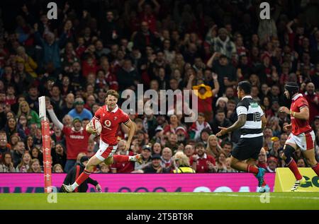 Wales' Tom Rogers scores their second try during the Guinness Men's Six ...