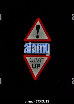 Tom Biddulph's installation. a set of revised road signs giving ...