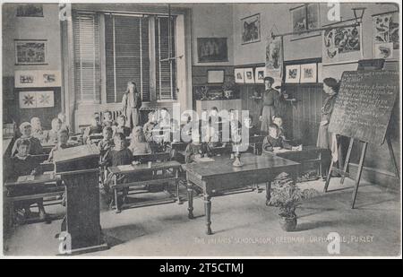 Early 1900's postcard of young school girls in classroom,U.K. circa ...