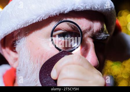 Portrait of senior man in Santa hat Stock Photo - Alamy