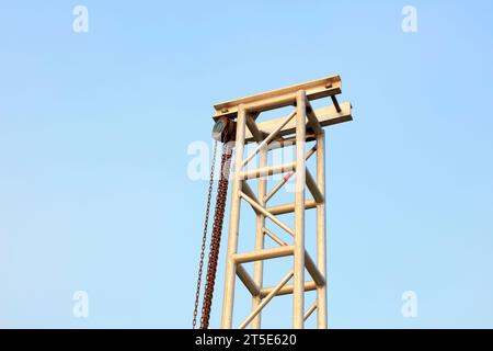 Steel brackets and chains Stock Photo - Alamy