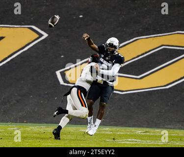 Colorado quarterback Shedeur Sanders (2) is hit by BYU linebackers ...