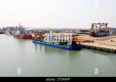 busy shipyard dock and docked ships, north china Stock Photo - Alamy