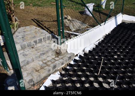 Ecological build of the car parking using crushed stone and plastic ...
