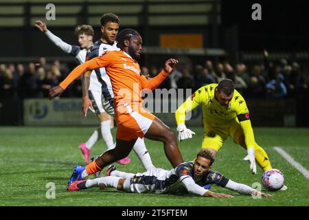 Kylian Kouassi #27 of Blackpool fouls Corey Whitely #18 of Bromley ...