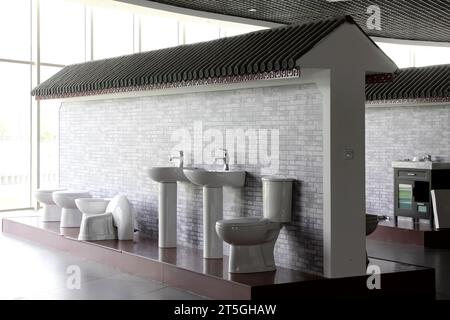 Ceramic toilet display in a hall, closeup of photo Stock Photo - Alamy