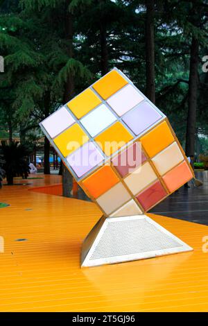 Rubik's cube sculpture in a garden, closeup of photo Stock Photo - Alamy
