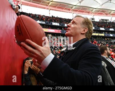 NFL commissioner Roger Goodell signs an autograph prior to an NFL ...