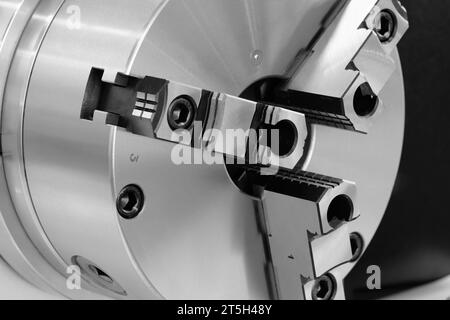 Manufacturing CNC professional lathe machine. Industrial concept. Close ...