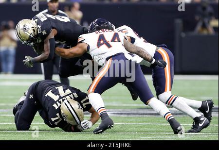 Chicago Bears linebacker Noah Sewell (44) tackles Dallas Cowboys tight ...