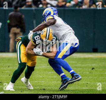 Green Bay Packers' Luke Musgrave fumbles as he is hit by New York ...