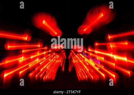 Red stretching effect in black background Stock Photo - Alamy