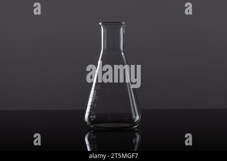 Close up of laboratory beaker and copy space on black background Stock ...