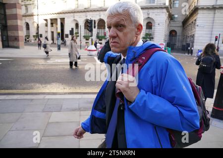 Former Metropolitan Police Officer Michael Fanone walks through the ...