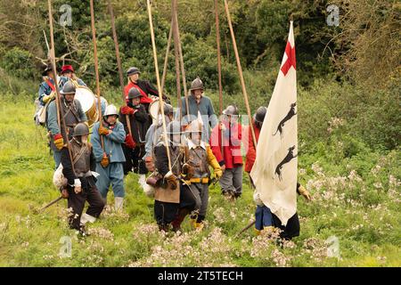 English Civil War Royalist foot soldiers: an armoured pikeman (left ...