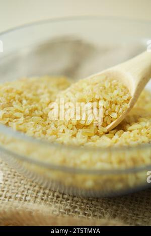 Raw bulgur heap Stock Photo - Alamy