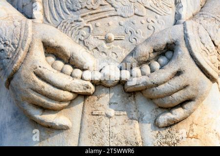 Chinese ancient stone carvings arm Stock Photo - Alamy