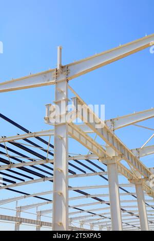 steel girder truss under blue sky, closeup of photo Stock Photo - Alamy