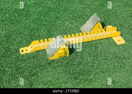starting block in the green plastic playground Stock Photo - Alamy