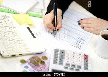 Accountant fill italian tax form F24 Unified payment model in end of ...