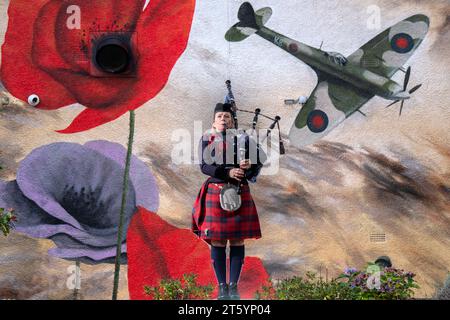Scotland's National Piper Louise Marshall plays at The Kelpies in ...