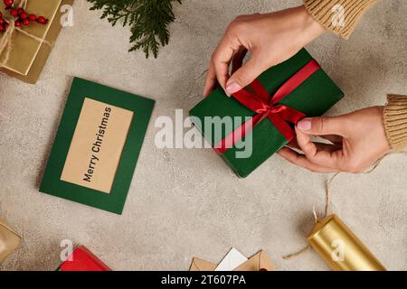 Top view of festive candles near serpentine on sprinkles on yellow ...