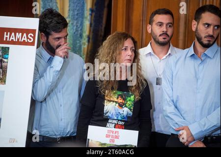 Liran Berman, left, brother of Hamas hostages Gali and Ziv Berman ...