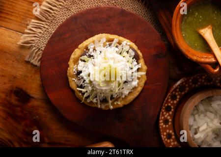 Top view of Chalupas, Typical Mexican dish made with tortillas, sauce ...