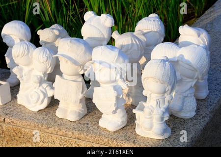 Gypsum cartoon characters Stock Photo - Alamy