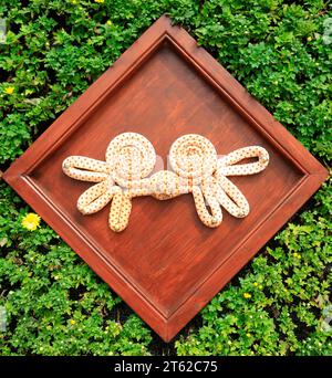 Green sculpture of Chinese traditional loop shape Stock Photo - Alamy