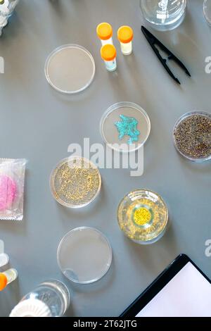 Set of Petri dishes with liquid samples on white background Stock Photo ...