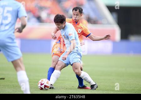 Shandong Taishan Football Club defeated Tianjin Jinmen Tiger Football ...