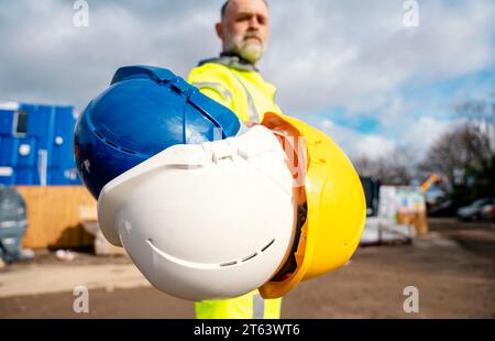 Engineer builder wearing suit and helmet at construction site Stock ...