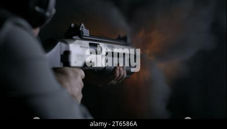 High-Speed 800fps Slow-Motion Speed-Ramp of Man Firing Shotgun ...